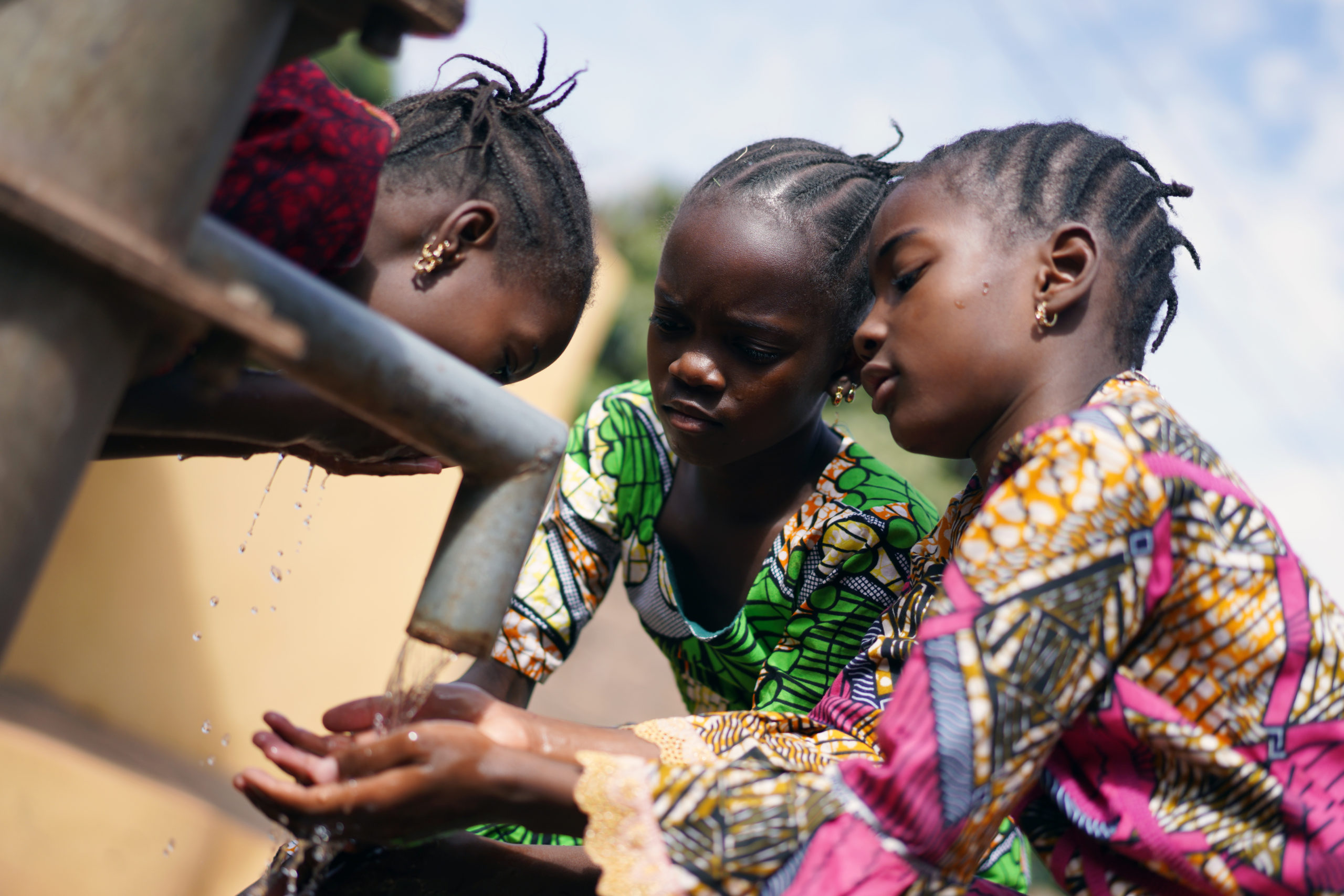 Children Fetching Water - Tel International